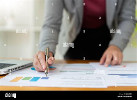 Business Analyst Concept The Data Analyst Calculating The Diagrams
