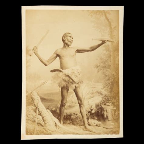 Aboriginal Man In A Fighting Stance With Parrying Shield Club And