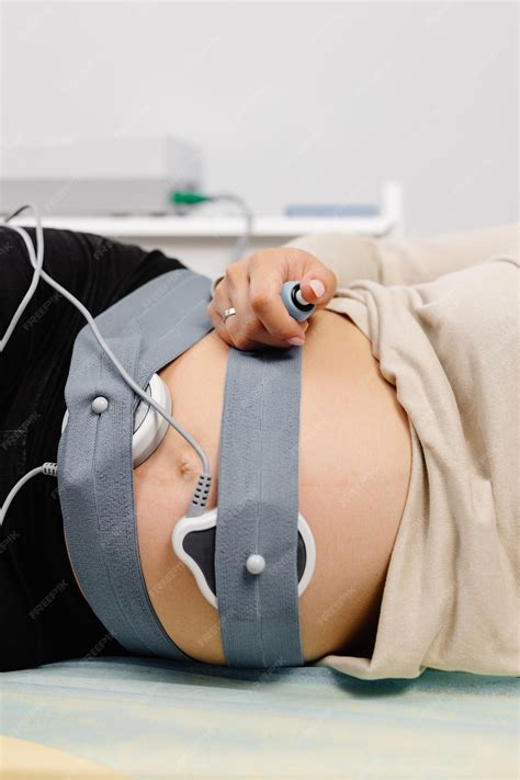 Premium Photo Woman Pregnant Checking Fetal Heart Beat By Fetal Monitoring Expectant Mother