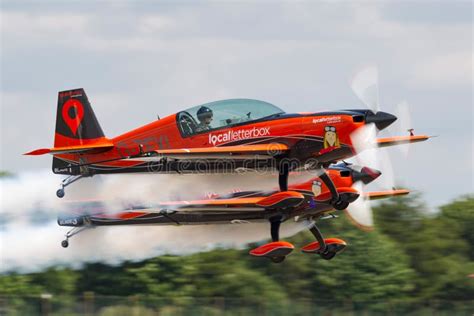 The Blades Formation Aerobatic Team Flying Extra Ea 300l Aerobatic