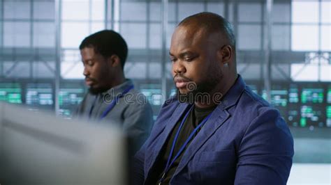 Portrait Of Happy Server Room Worker Developing Disaster Recovery Plans
