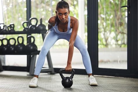 Premium Photo The Real Workout Starts When You Want To Stop Shot Of A Young Woman Working Out