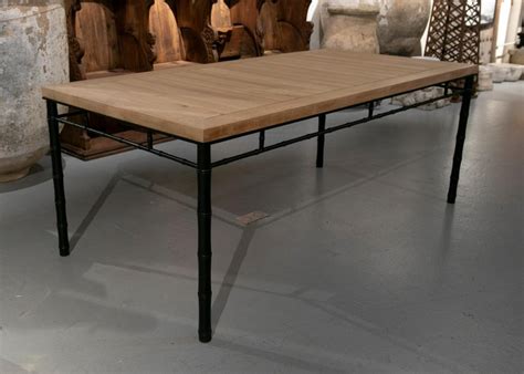 table with iron base imitating bamboo with wooden top in its original