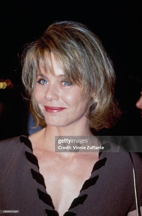 American Actress Susan Dey Wearing A Black And Grey Outfit Attends