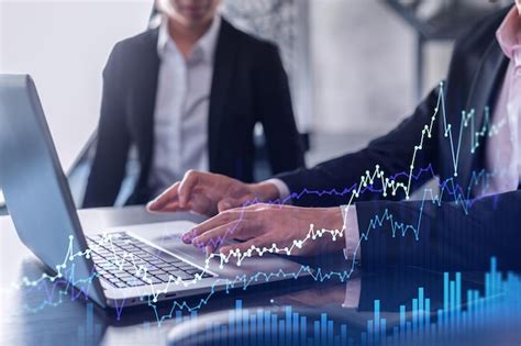 Premium Photo Two Traders Man And Woman Researching Historic Data To Predict Stock Market