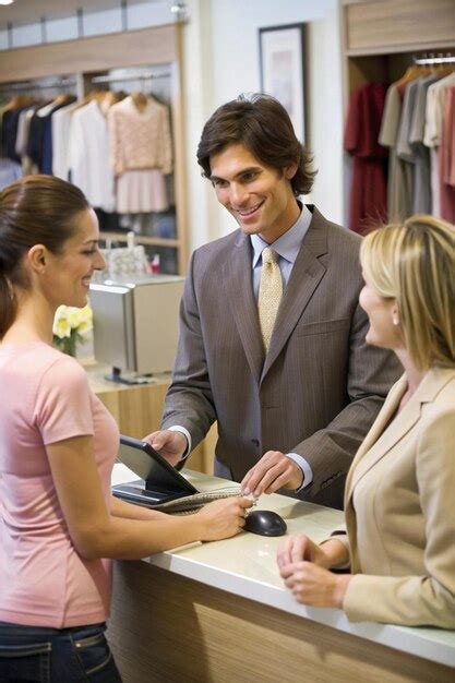 Sales Clerk Working With Customers Premium Ai Generated Image