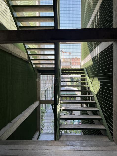 Industrial Building Featuring A Striking Exposed Concrete Structure Complemented By A Sleek