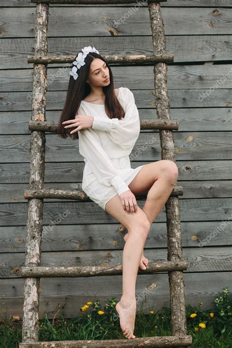 Girl Climbing Ladder Into Tree House Stock Photo Simbiothy 76505295