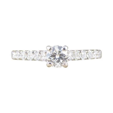 Contemporary Diamond Ring With Diamond Set Shoulders In 18 Carat White