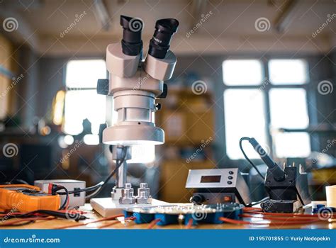 Modern Microscope Connectors Component And Large Green Microcircuit In