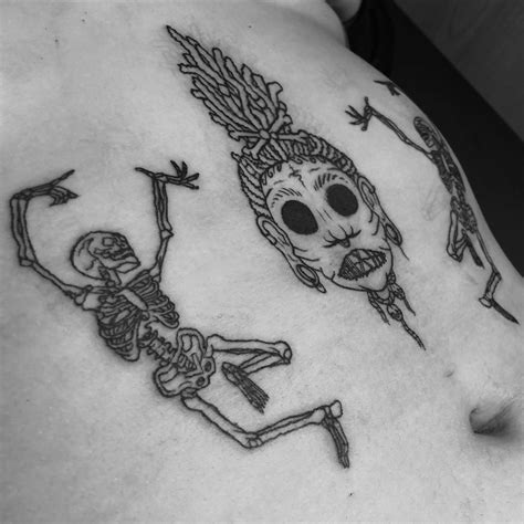 Shrunken Head Tattoo Designs