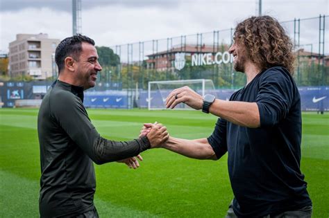 کاپیتان اینجاست حضور کارلوس پویول در تمرین بارسلونا عکس طرفداری