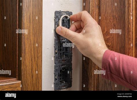 Wall Socket The Process Of Installing An Electrical Outlet Stock Photo Alamy