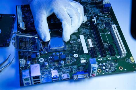 Technician Installing Cpu Onto Motherboard Stock Photos Free Royalty Free Stock Photos From