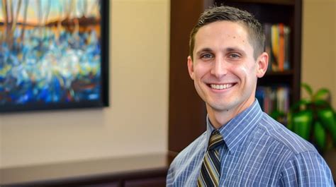 Premium Photo Handsome Smiling Chiropractor Headshot