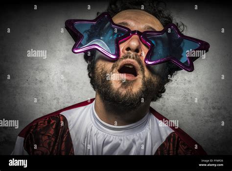 Foolish Stupid Man With Glasses Graceful Gestures And Ridiculous Party