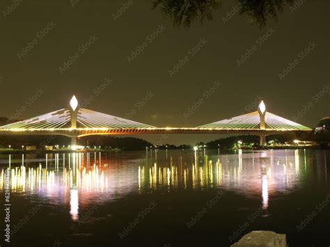 A Night View Of The The Durgam Cheruvu Cable Bridge Of City Skyline And