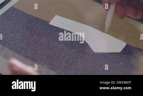 Close Up View Of Graphic Designer Using Stylus And Zooming Screen While