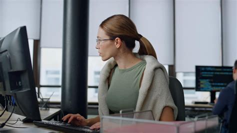 Premium Photo Software Manager Typing Computer In Office Upset Woman