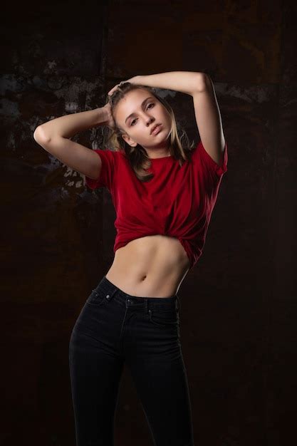 Premium Photo Test Shooting For Seductive Young Model Wears Jeans And