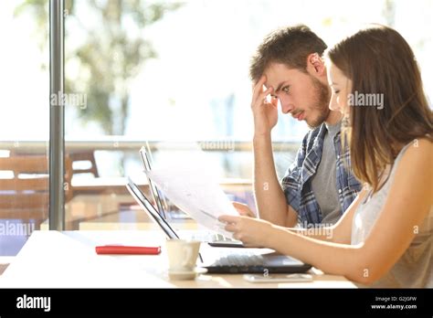 Bad Student Learning With Difficulties And A Friend Teaching Him In A