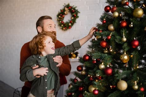 Man Holding Redhead Son Sticking Out Stock Image Image Of Baubles Christmas 261613671