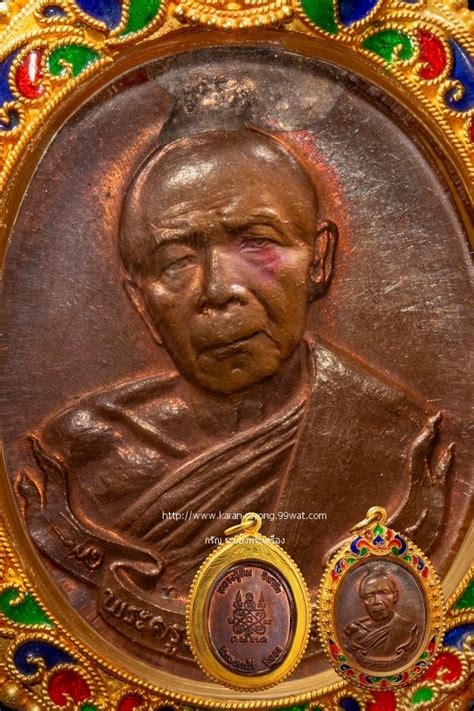 เหรียญห่วงเชื่อม บล็อคนิยมสุด ภ ขีด คอวน ผมหวี หลวงปู่ทิม วัดละหารไร่ 2518 เลี่ยมทองลงยาลาย