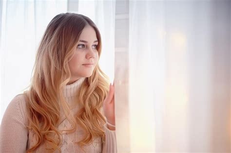 Premium Photo Cute Blonde Sweater Portrait Winter Look Portrait Of