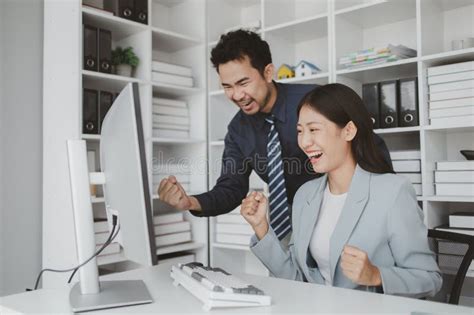 Two Programmers Looking At Computer Screen Programmer Design Custom Computer Programming