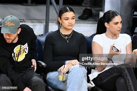 Madison Bailey Attends A Basketball Game Between The Los Angeles