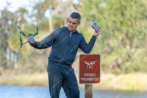 Premium Photo Operator Is Disappointed Because He Can Not Fly His Quadcopter In National Park