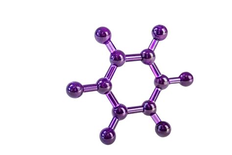 A 3d Model Of A Benzene Ring With Six Interconnected Purple Spheres Representing Carbon Atoms
