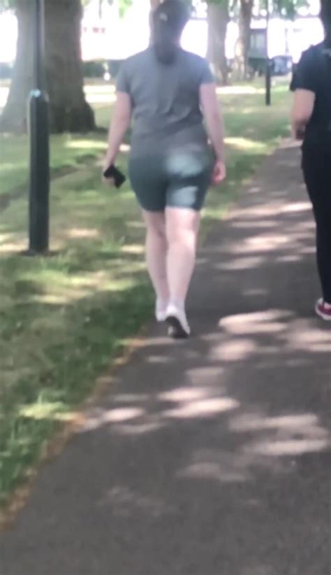 Two Juicy Pawgs Walking In The Park Thisvid Com