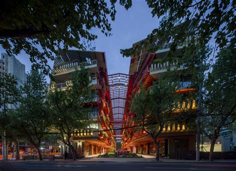 jean nouvel bisects city block with street of 1 000 red jars in shanghai