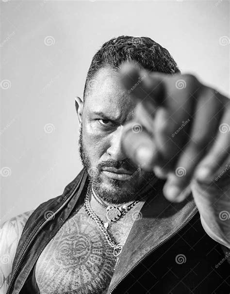 Man With Serious Face Showing Or Pointing Man With Beard And Glasses Feeling Confident Stock