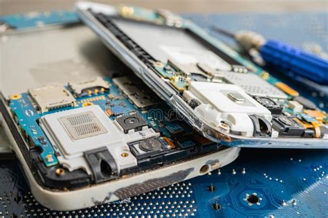 Repairing And Upgrade Mobile Phone Electronic Computer Hardware And Technology Concept Stock