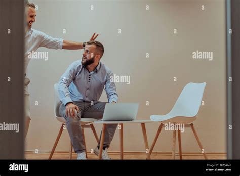 Programmers Have Fun On A Break From Work While Working Together To