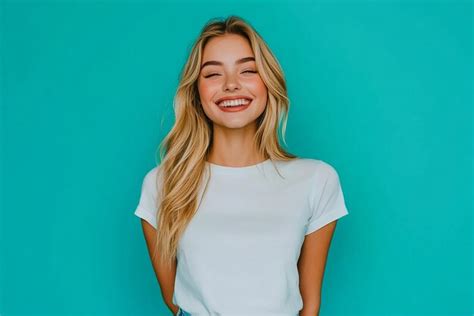 A Woman With Blonde Hair And A White Shirt That Says Shes Smiling Premium Ai Generated Image