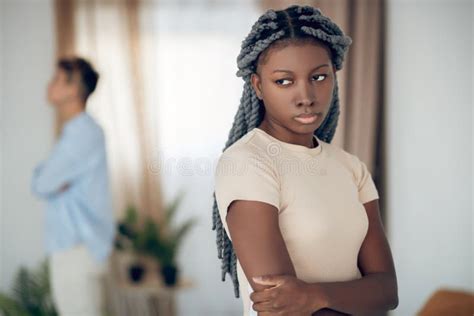 Same Sex Couple Having An Argument And Looking Frustrated Stock Photo