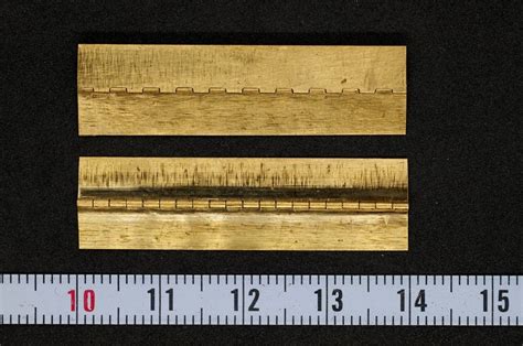 continuous piano hinges brass axle 0 8mm loop pitch 2 0mm 2 pieces