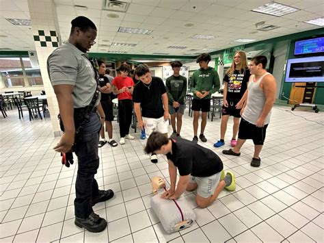 Flagler County Fire Rescue Paramedics Teach Fpc Football Players Hands