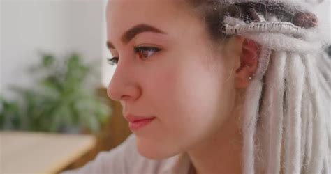 the girl with the bionic hand is creating a picture bionics cybernetic robotic arm hand