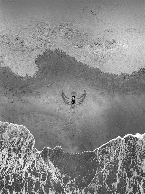 Female Angel On The Beach Drone Photo From Above Editorial Stock Image