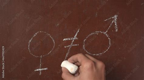 Textured Brown Chalkboard Background Male Hand Drawing Not Equal Symbol Between Two Gender