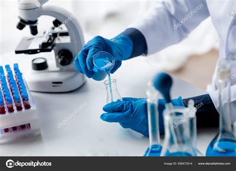 Laboratory Assistants Investigating Chemical Reactions Medical