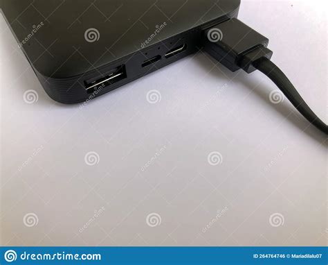 Usb Charger Cable Attached To The Power Bank Usb Port Stock Photo Image Of Charger Telephone
