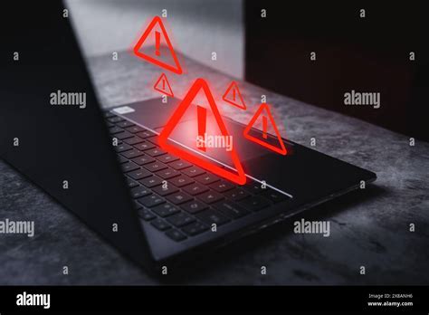 Laptop With Hologram Warning Sign For Notification Error Programmer