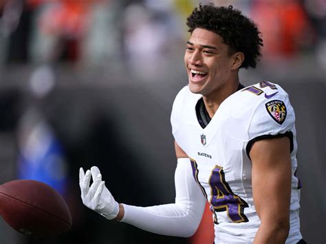 Download Smiling Football Player Kyle Hamilton Wallpaper Wallpapers Com