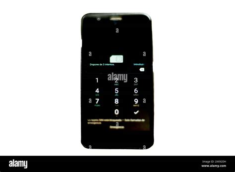 Photograph Of A Smartphone With An Illuminated Numeric Keypad Display Perfect For Illustrating