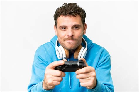 Premium Photo Brazilian Man Playing With A Video Game Controller Over Isolated White Background Premium Photo Brazilian Man Playing With A Video Game Controller Over Isolated White Background